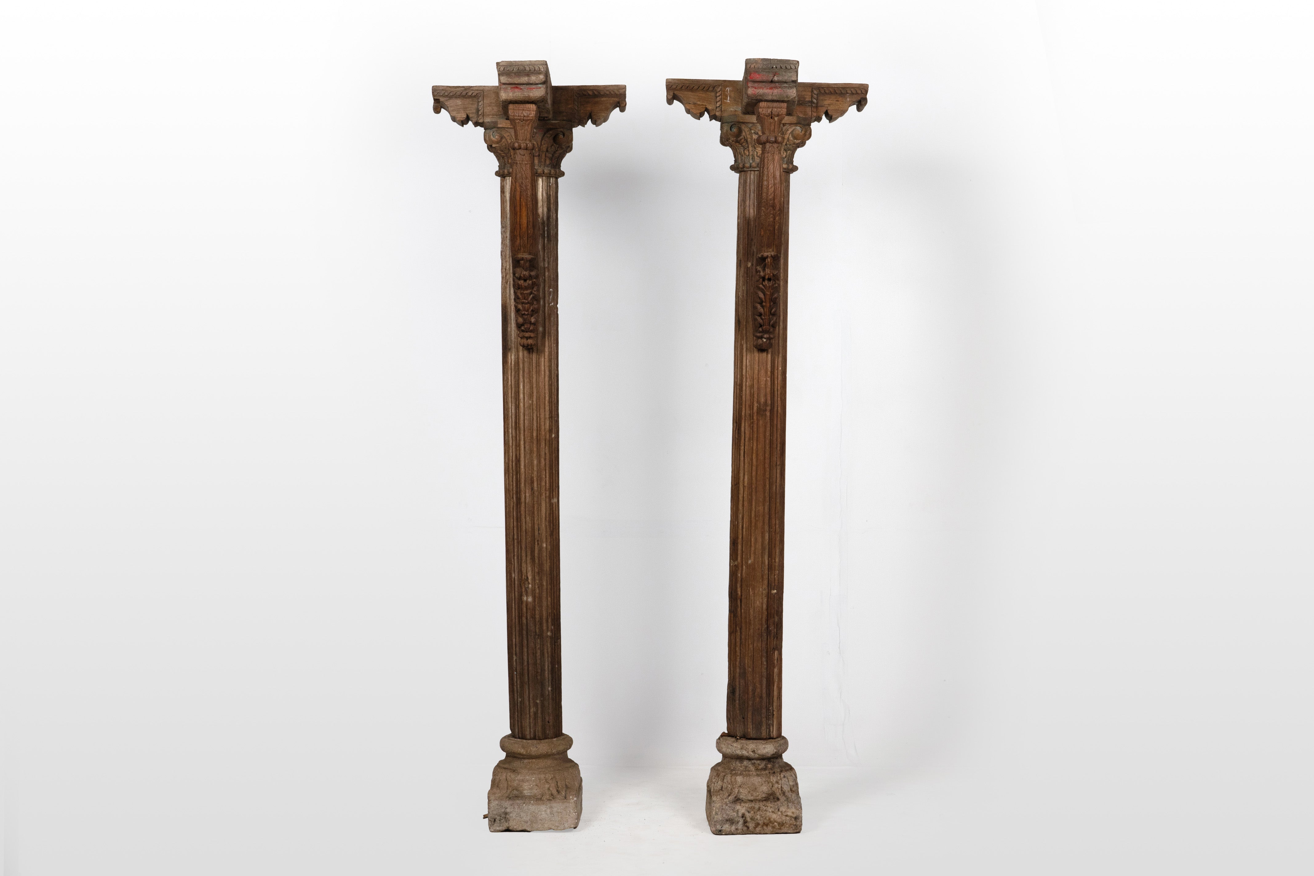 A Pair of Indian Wooden Columns with Brackets